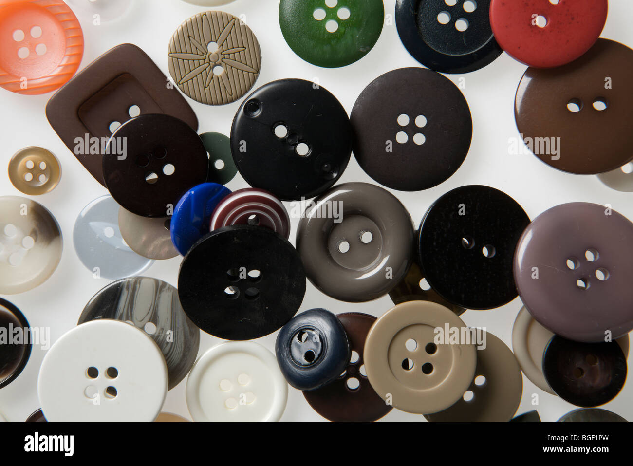 many buttons of different size and color Stock Photo - Alamy