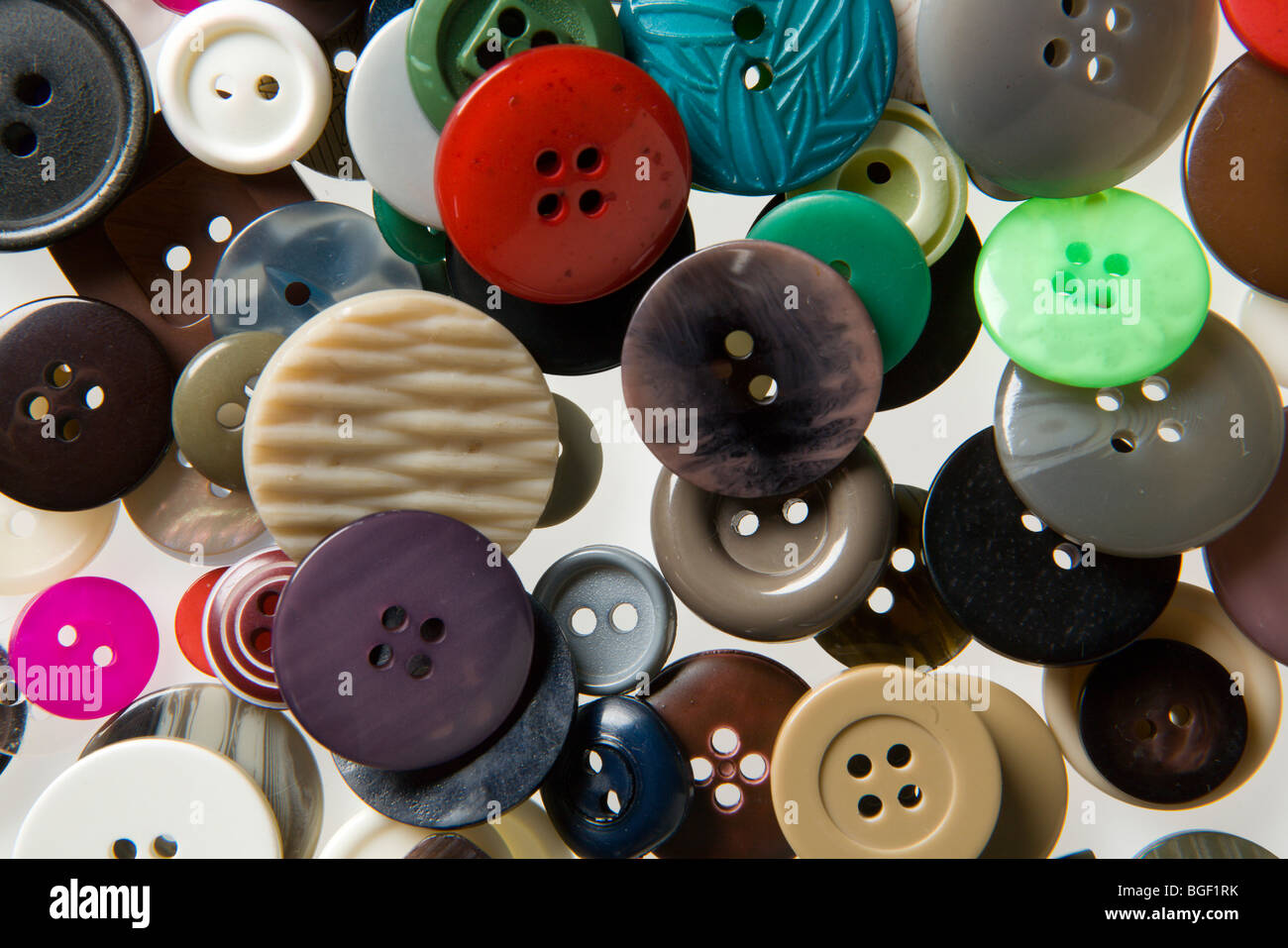 many buttons of different size and color Stock Photo - Alamy