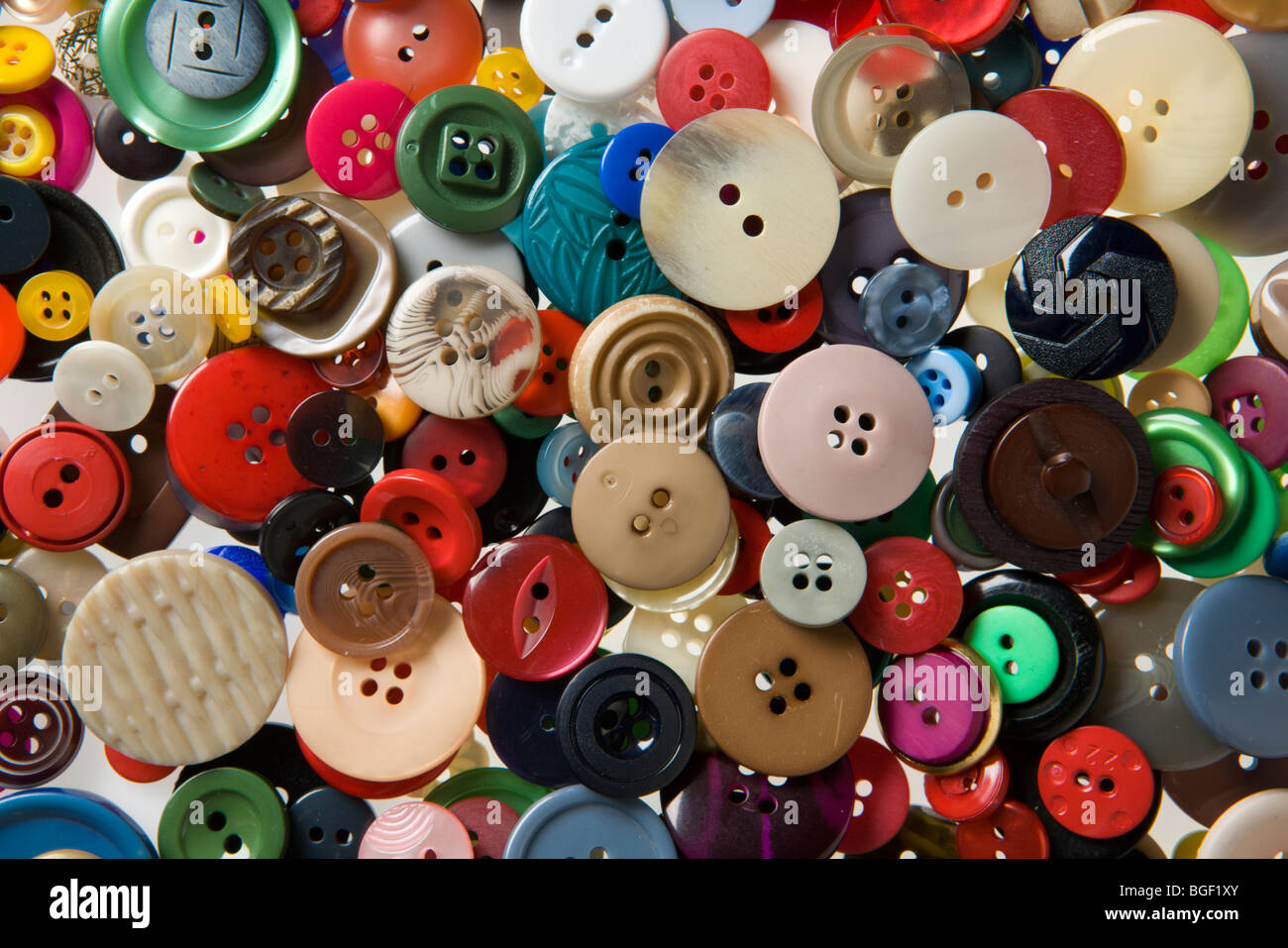 many buttons of different size and color Stock Photo - Alamy