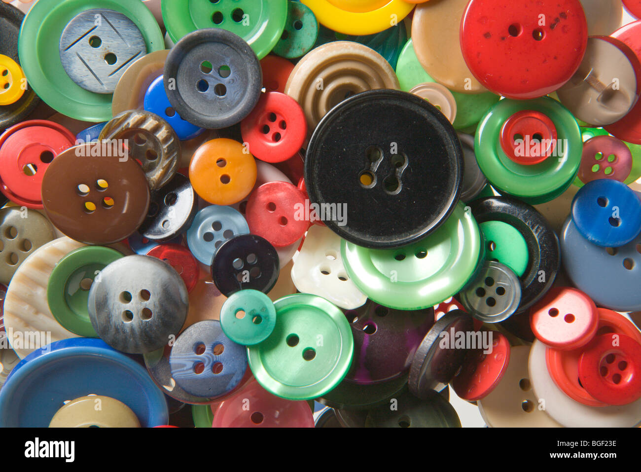 many buttons of different size and color Stock Photo - Alamy