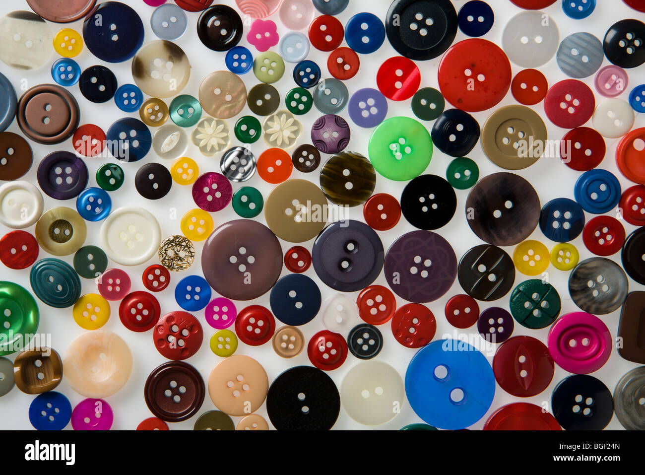 many buttons of different size and color Stock Photo - Alamy
