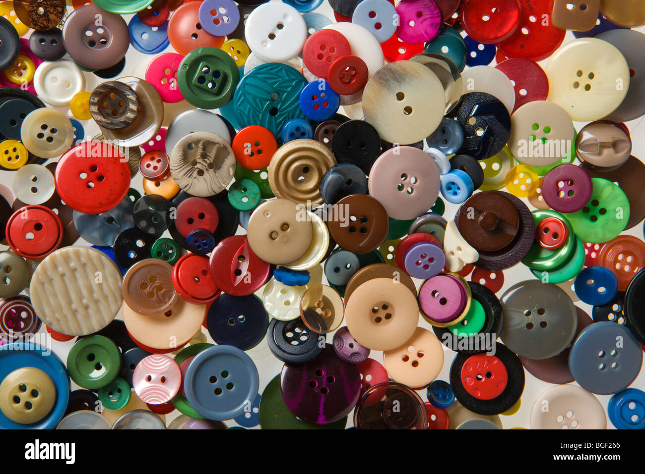 many buttons of different size and color Stock Photo - Alamy