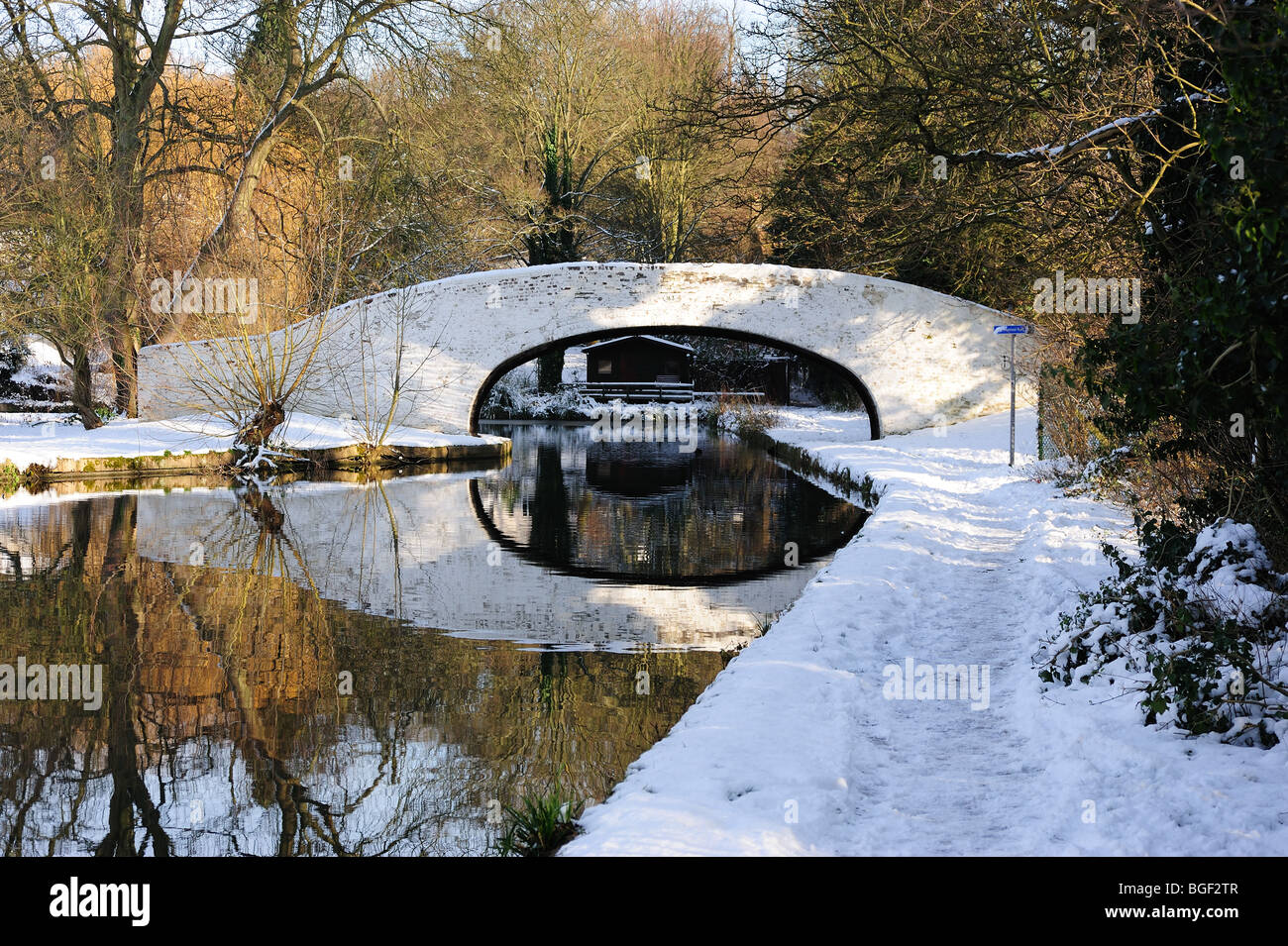 Bridge 163 reflection in the water of the Grand Union Canal near Hunton ...