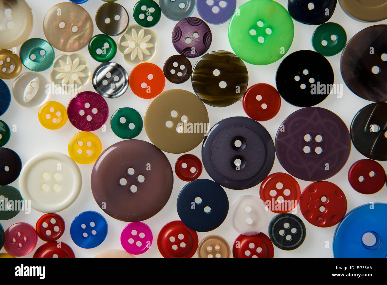 many buttons of different size and color Stock Photo - Alamy
