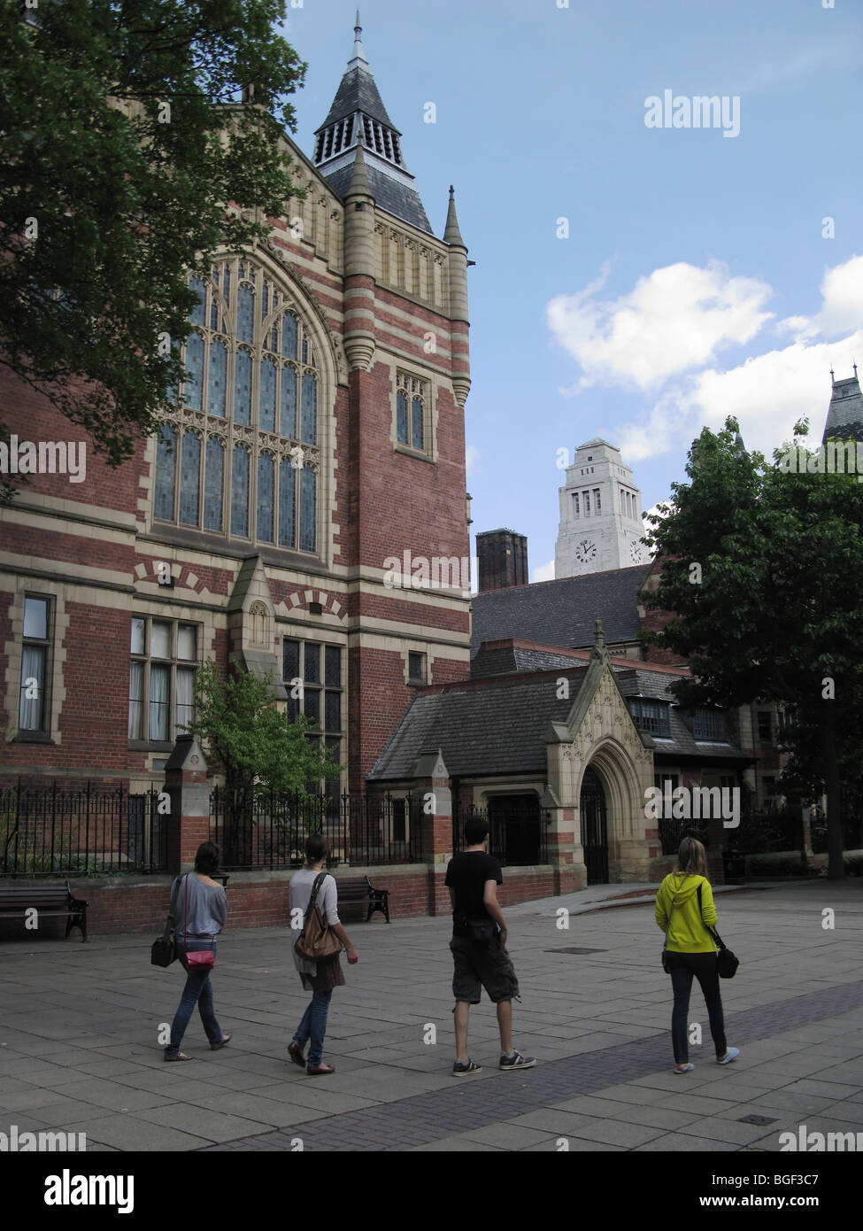 Group of four caucasian students by Great Hall of Leeds University ...