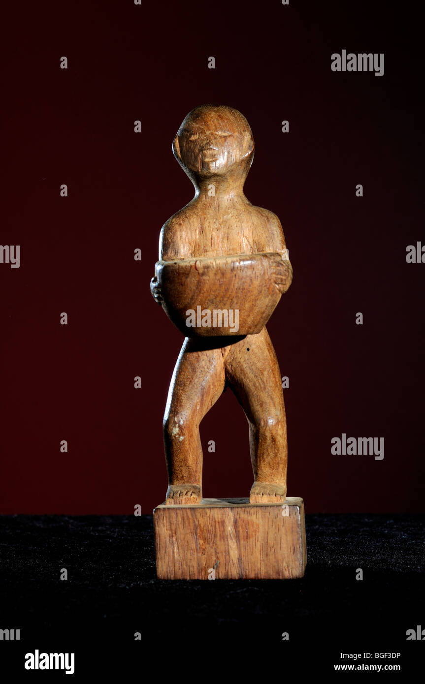 carved figure with container from bontok, luzon, philippines Stock ...