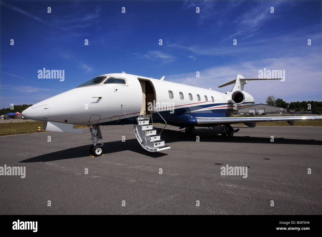 Private jet airplane parked on the tarmac Stock Photo - Alamy