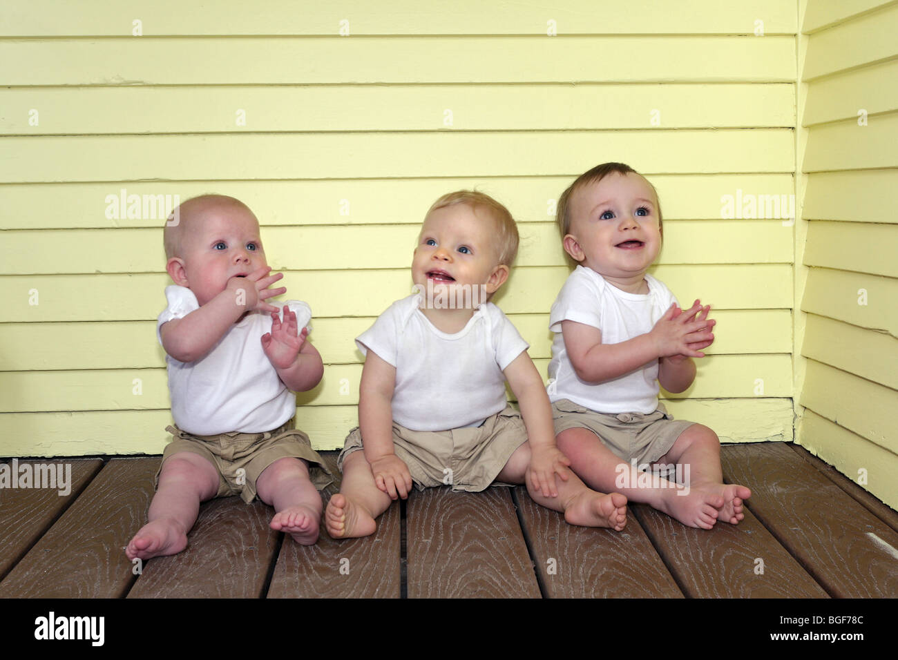 Three babies having fun together Stock Photo - Alamy