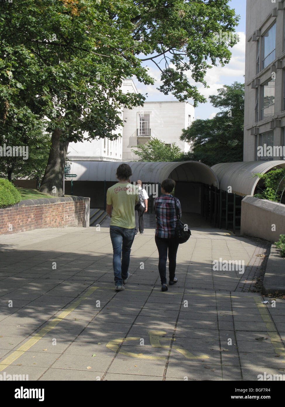 Students walking around campus of Leeds University Yorkshire UK Stock ...