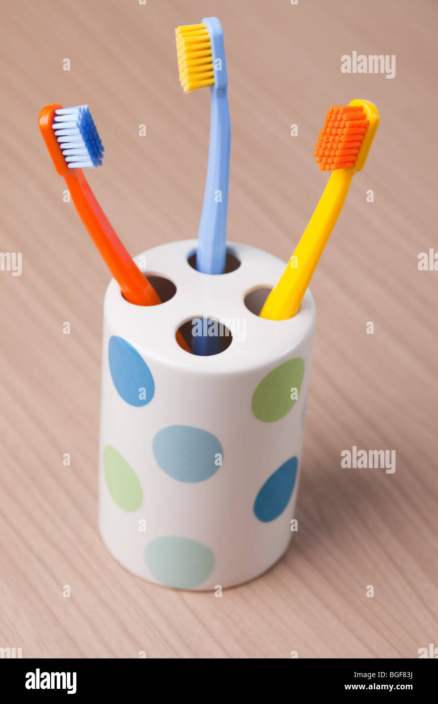 the photo shot of color toothbrushes Stock Photo - Alamy