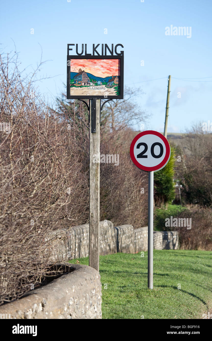 Two signs marking the entrance and boundary for the Sussex village of ...