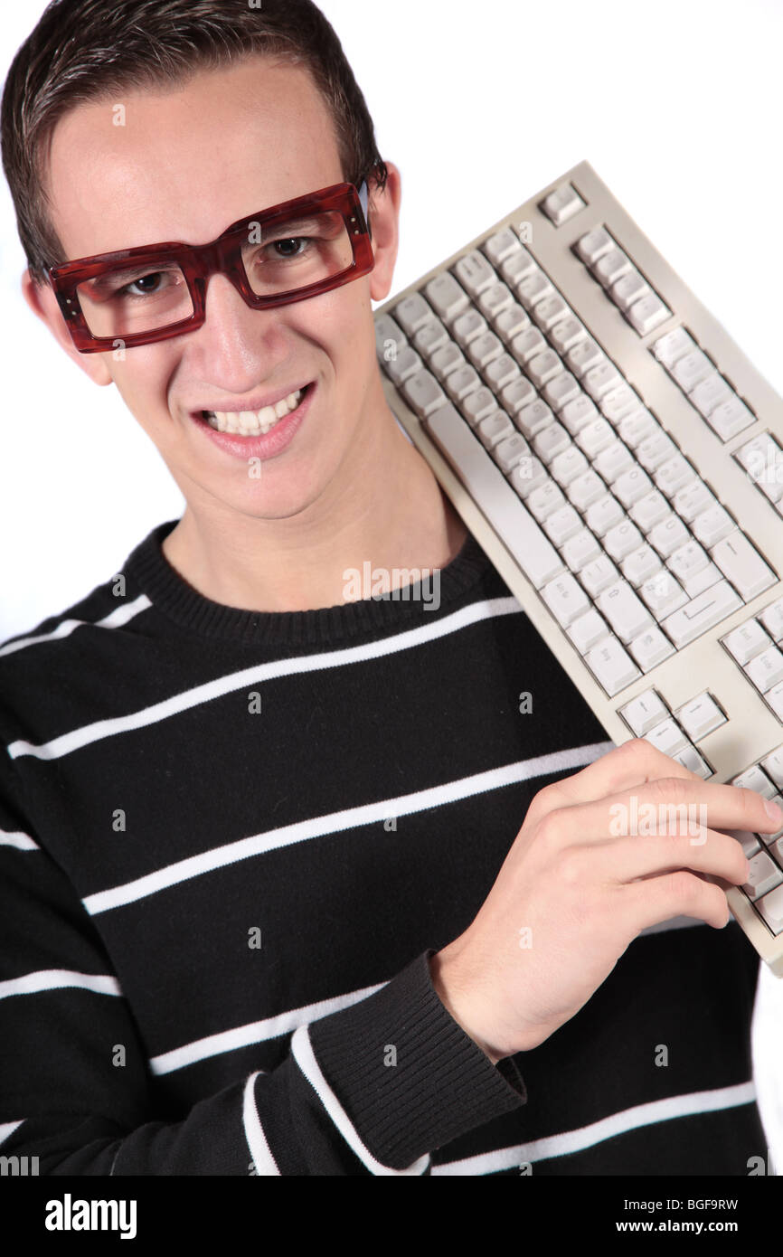 A typical nerd holding a keyboard. All isolated on white background ...