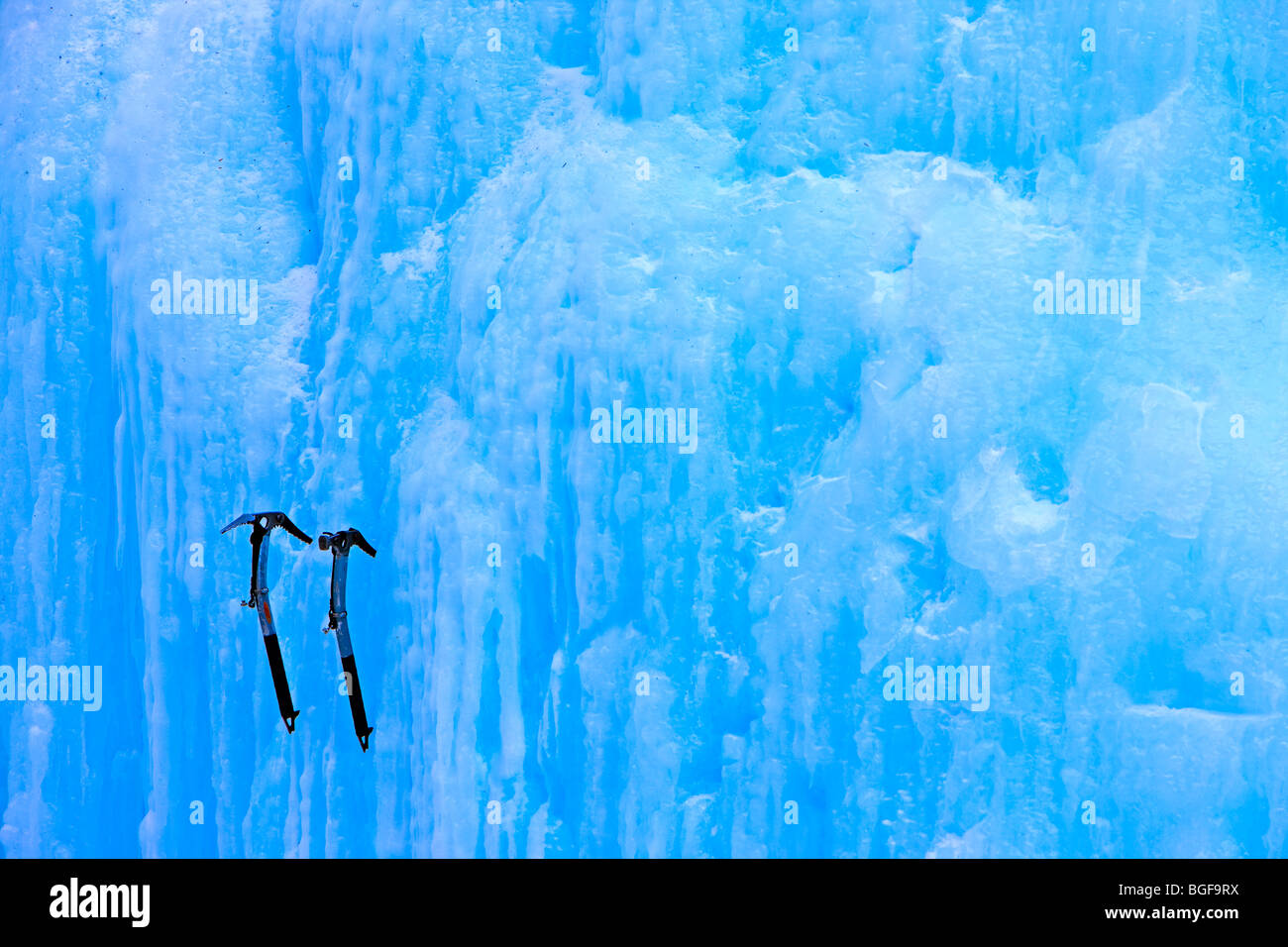 Two ice picks lodged on a frozen wall of ice at the Upper Falls during ...