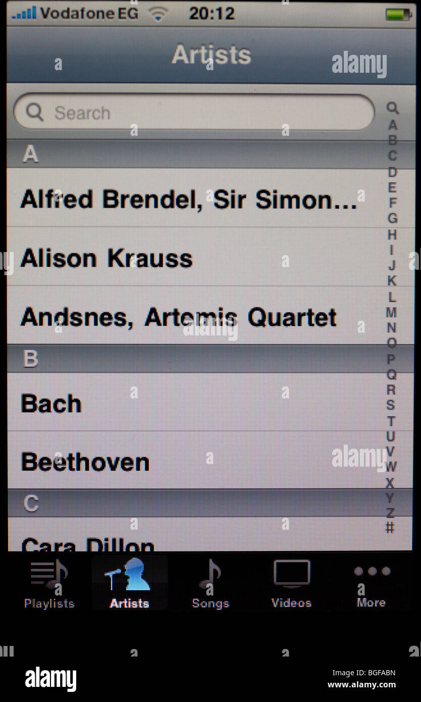 screen of Apple iPhone showing music artists available on iPod ...