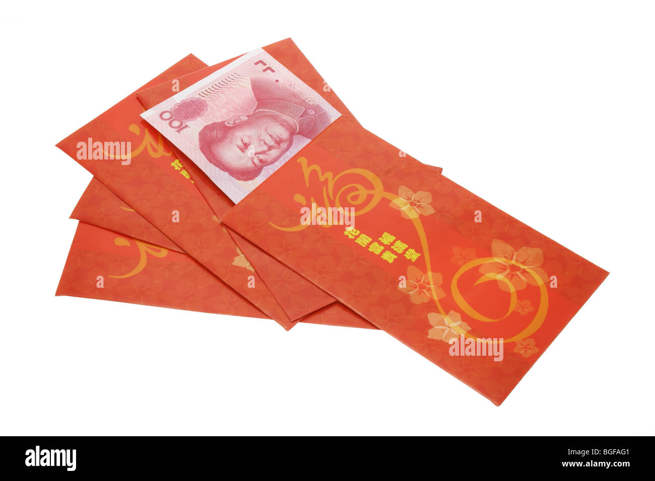Chinese New Year red packets and Renminbi currency on white background ...