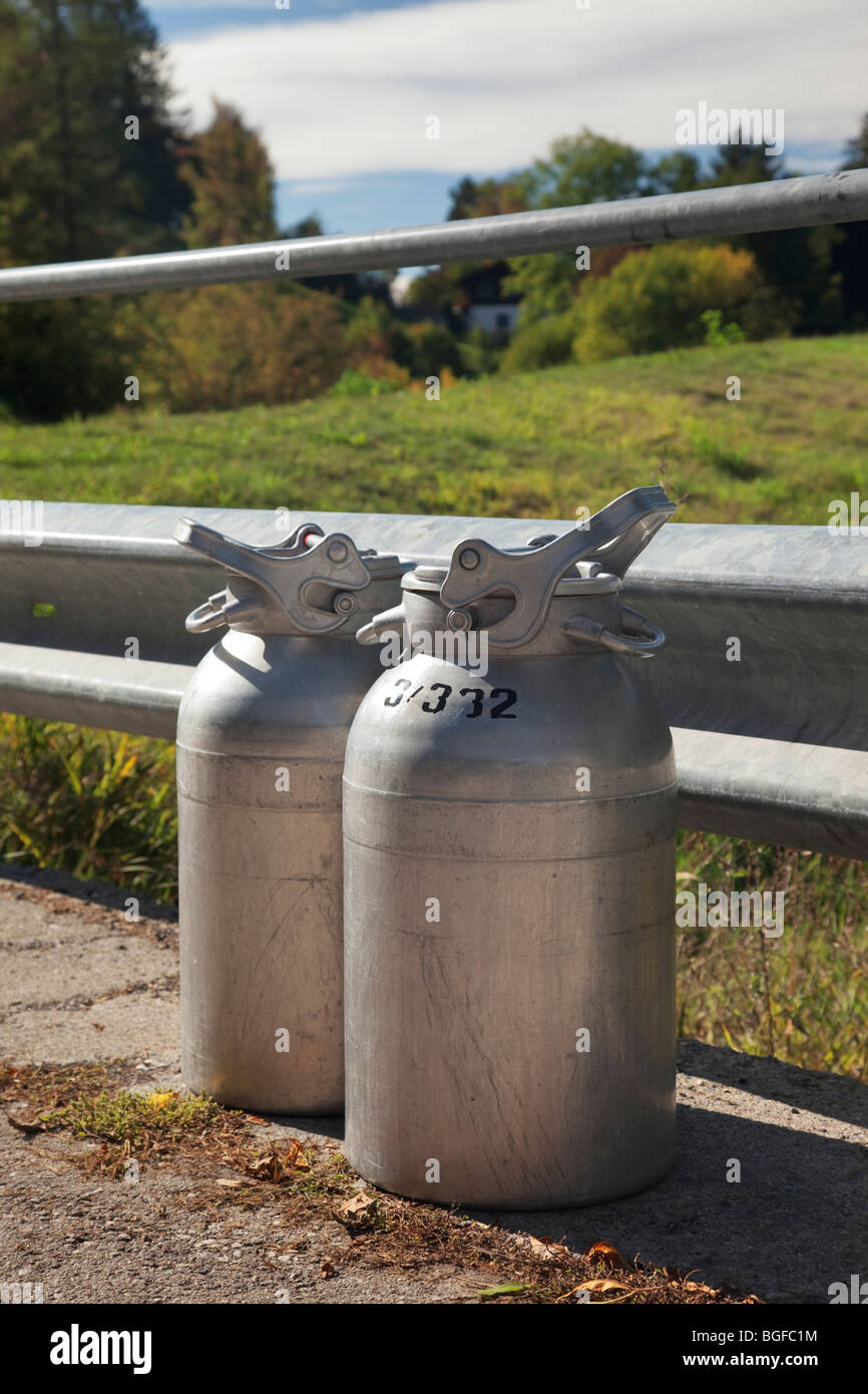 milk cans ready for pick-up Stock Photo - Alamy