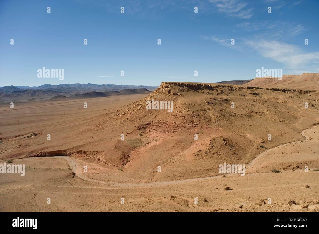 Escarpment and dry river bed in the Sahara desert near Tinerhir a small ...