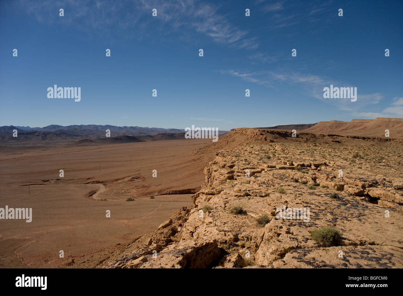 Escarpment and dry river bed in the Sahara desert near Tinerhir a small ...