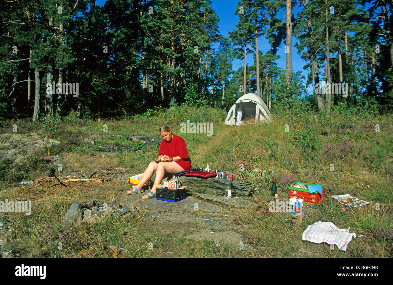 young woman camping at Lake Vanern, South of Sweden Stock Photo - Alamy