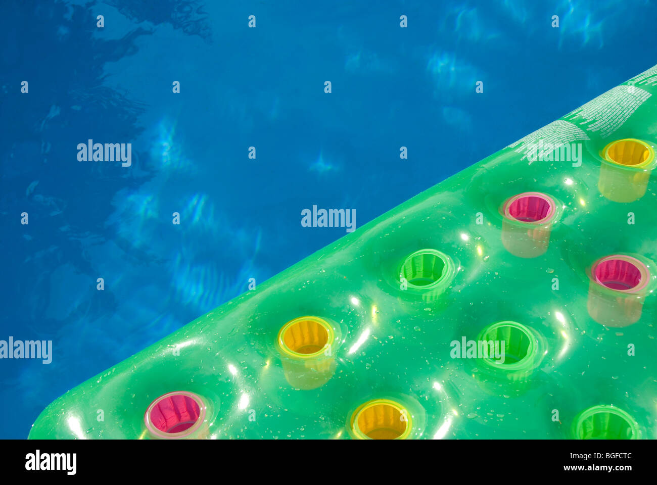 Section of inflatable sun bed floating in swimming [pool Stock Photo ...