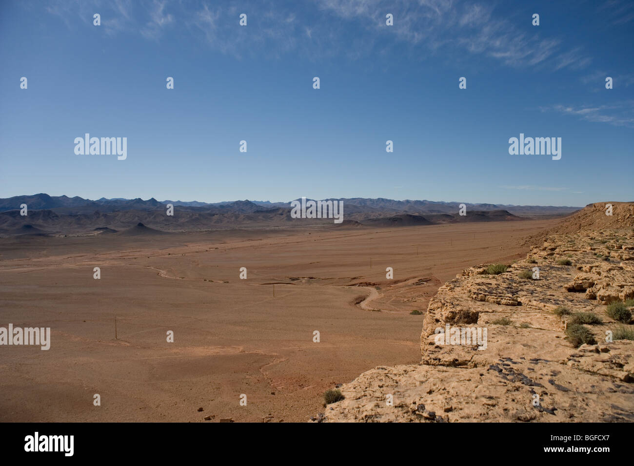 Escarpment and dry river bed in the Sahara desert near Tinerhir a small ...