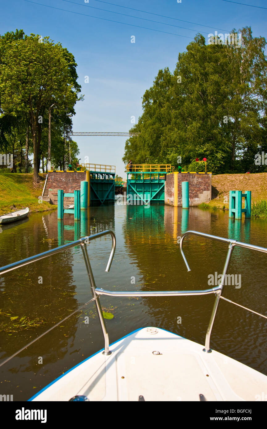 Bow of yacht approaching lock near Malbork on Nogat River, Pomerania ...