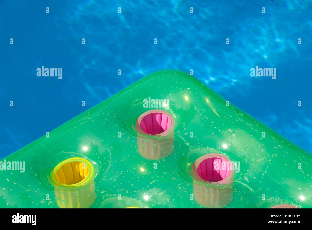 Section of inflatable sun bed floating in swimming [pool Stock Photo ...
