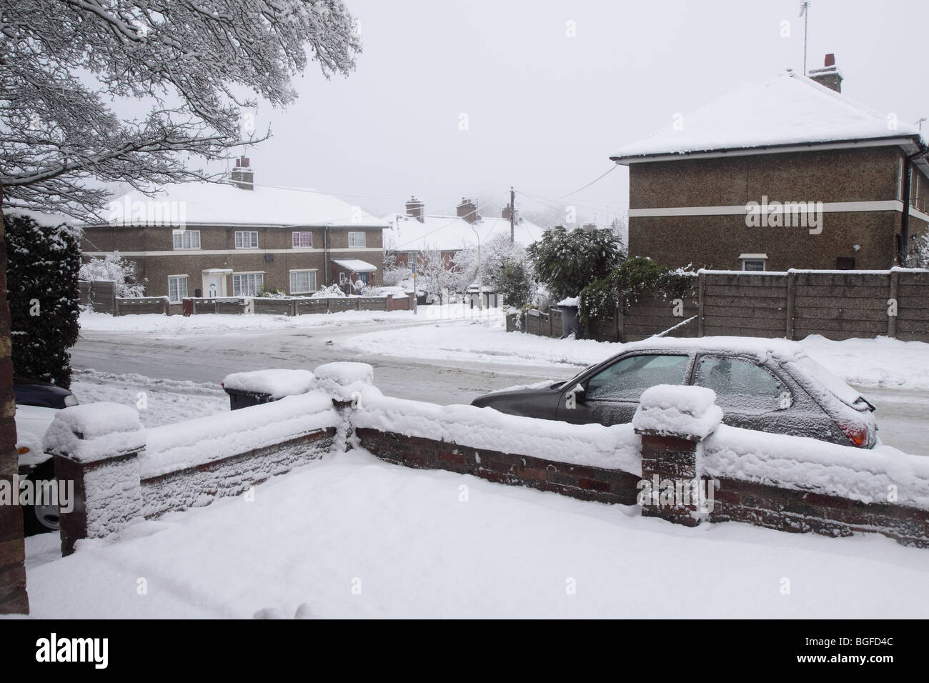 Snow covered suburban street in the UK Stock Photo - Alamy