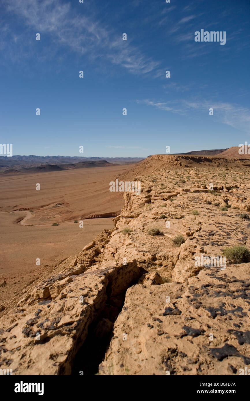 Escarpment and dry river bed in the Sahara desert near Tinerhir a small ...