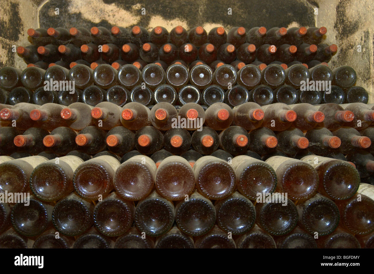 Stacks of vintage Rioja bottles ageing in a wine cellar in Spain Stock ...
