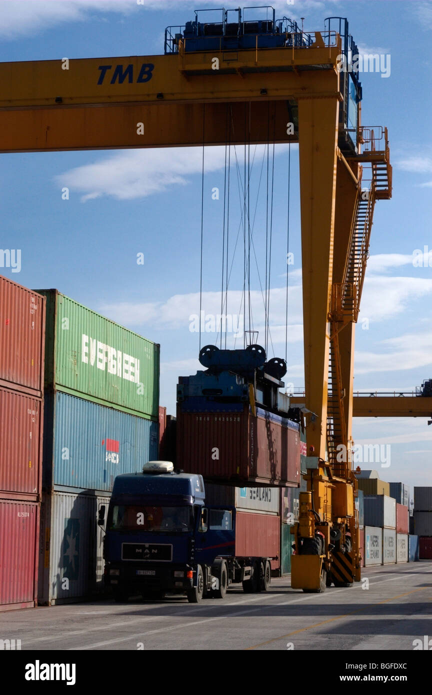 Loading containers, Bilbao Container Port Stock Photo - Alamy