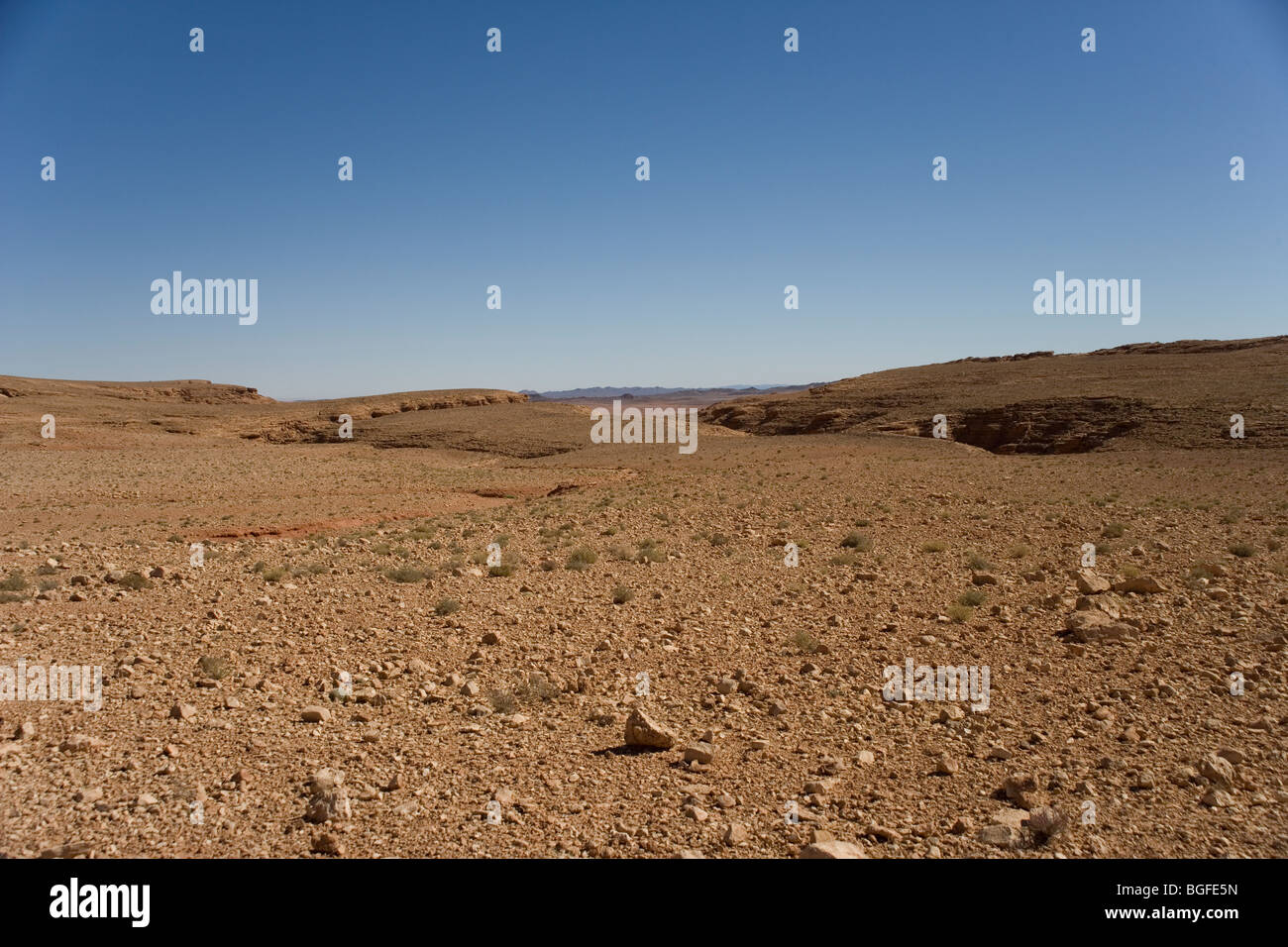 Escarpment and dry river valley in the Sahara desert near Tinerhir a ...