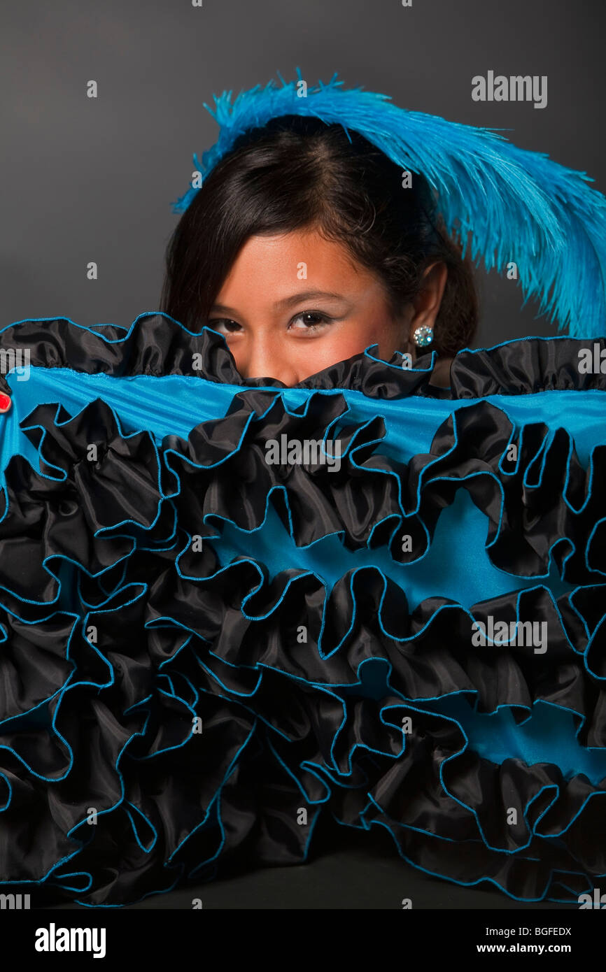 Girl covering face with dance dress, portrait Stock Photo - Alamy