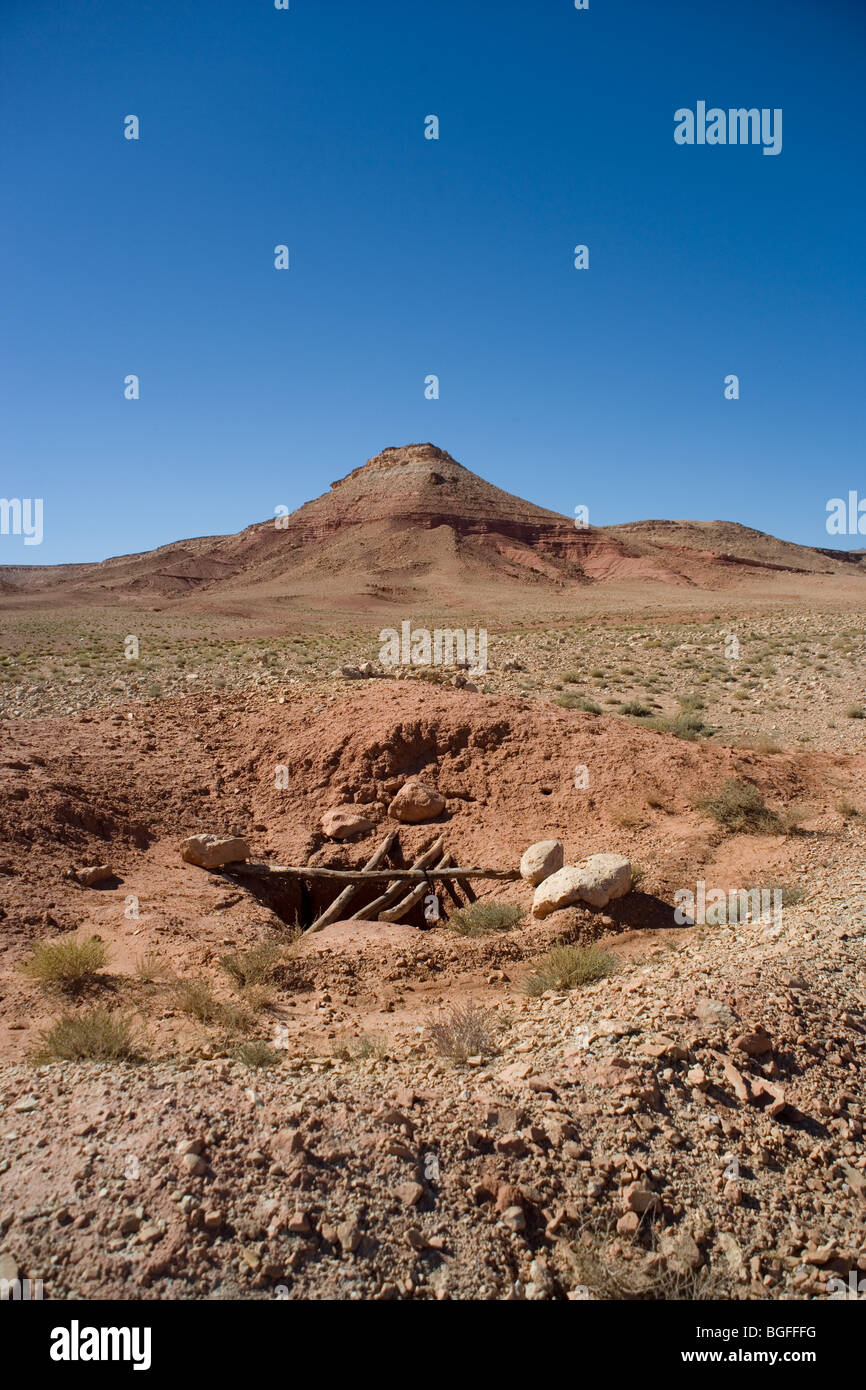 Nomadic Arab well on an escarpment heading to Tinerhir a small town ...