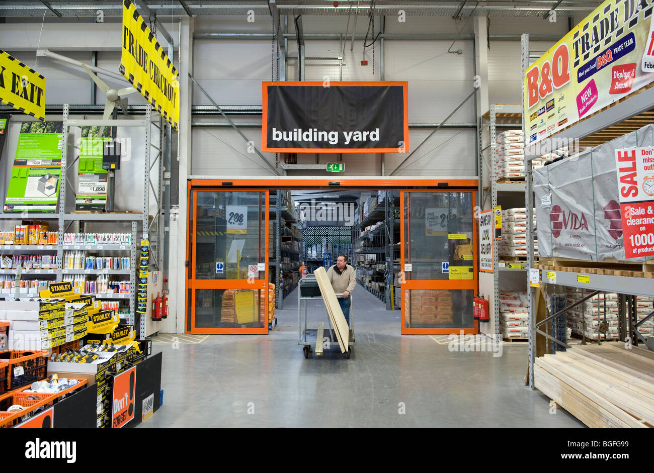 A man with building materials at a DIY superstore builders yard Stock ...