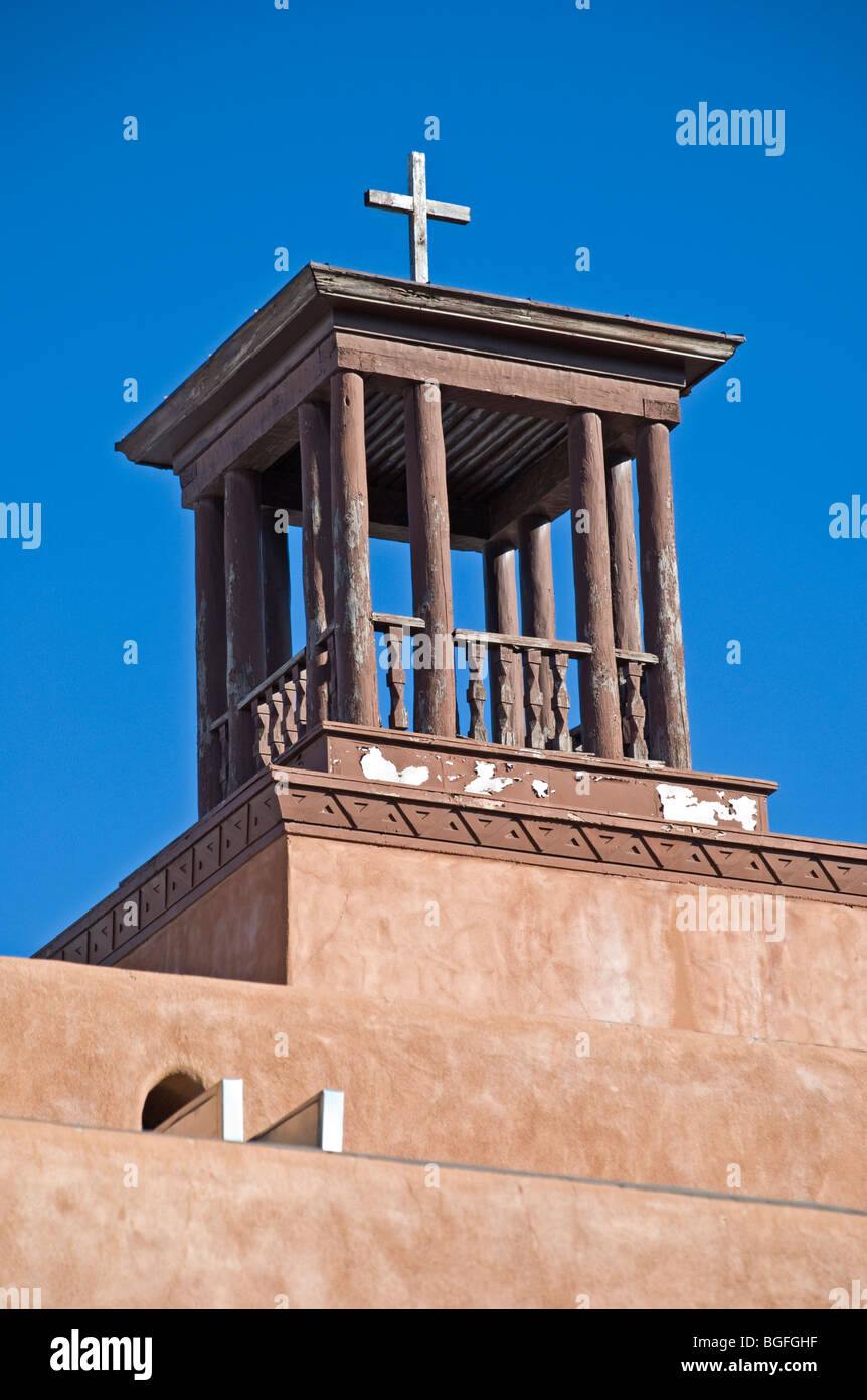 A church tower in Santa Fe stands out brilliantly against the clear ...