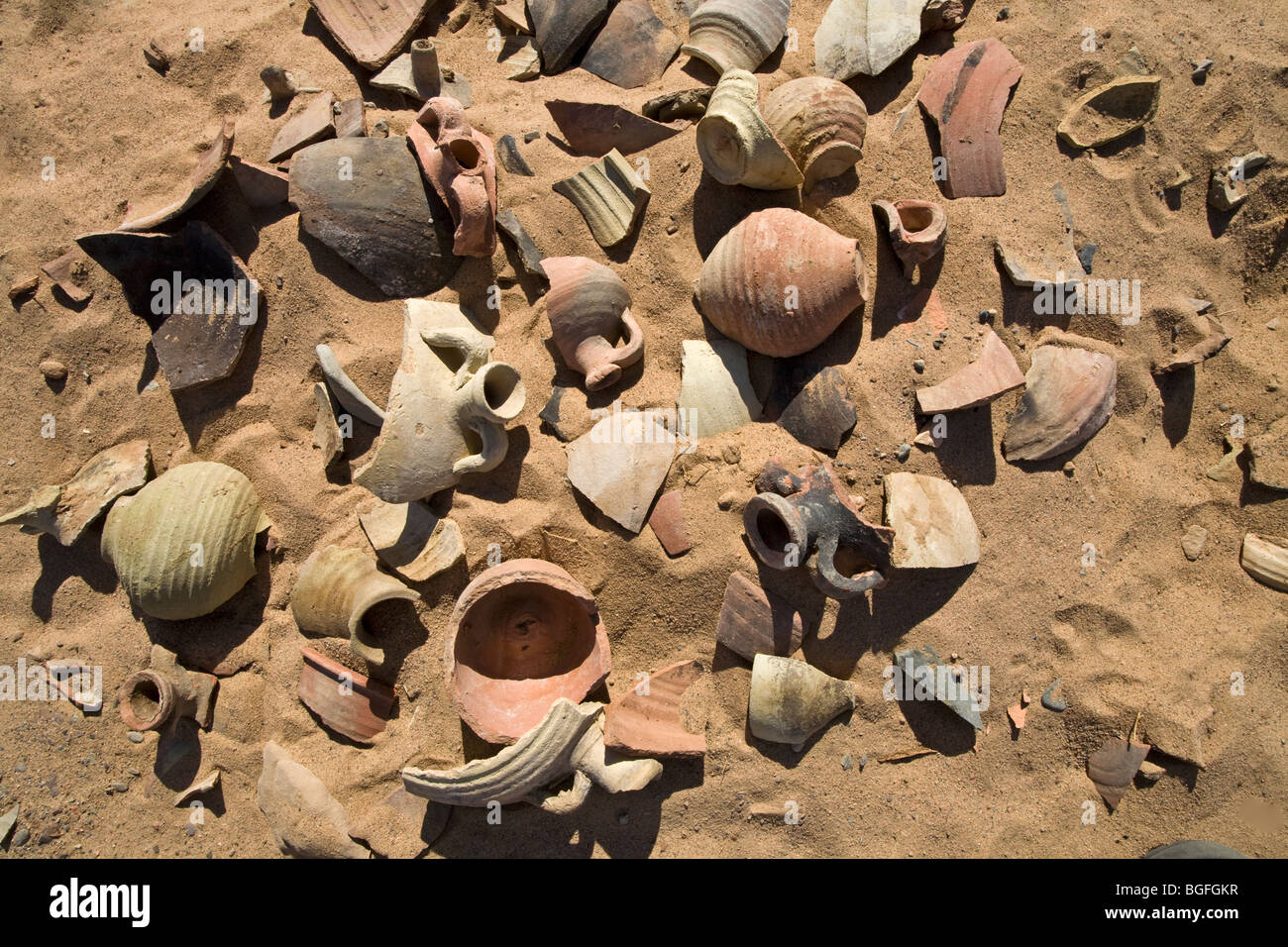 Piles of ancient pottery shards on the desert floor at Daydamus Roman ...