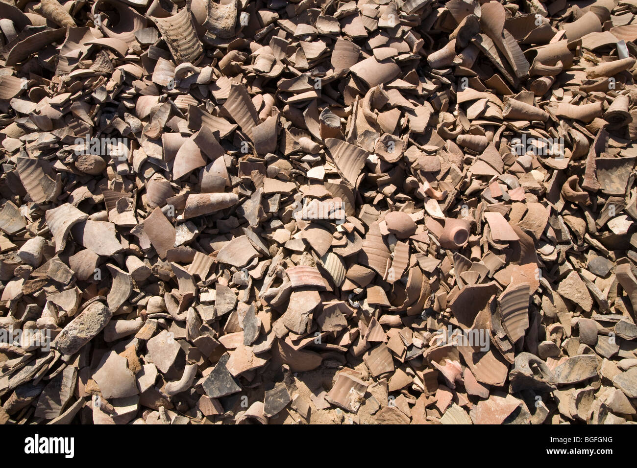 Piles of ancient pottery shards on the desert floor at Daydamus Roman ...