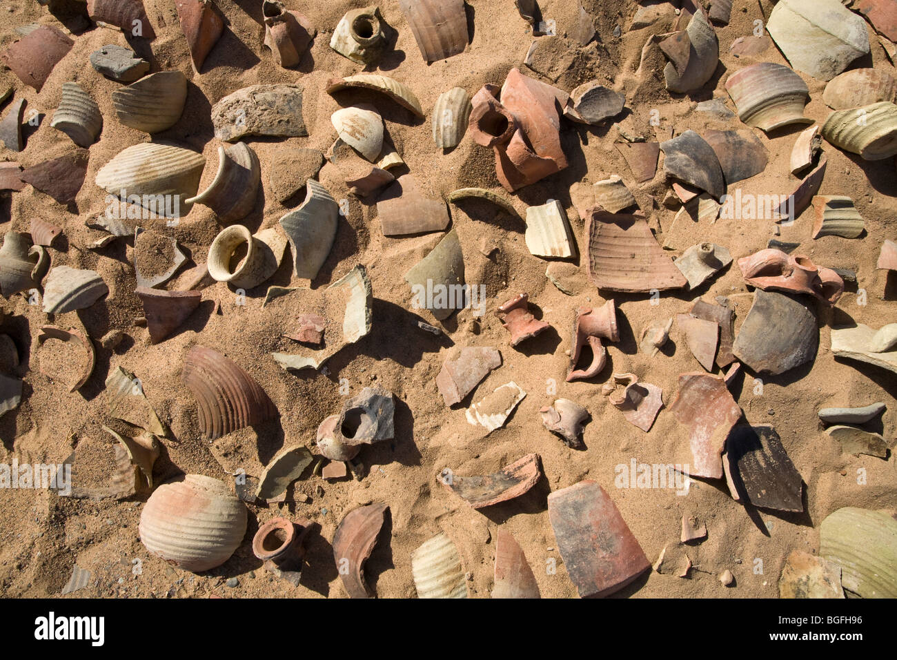 Piles of ancient pottery shards on the desert floor at Daydamus Roman ...