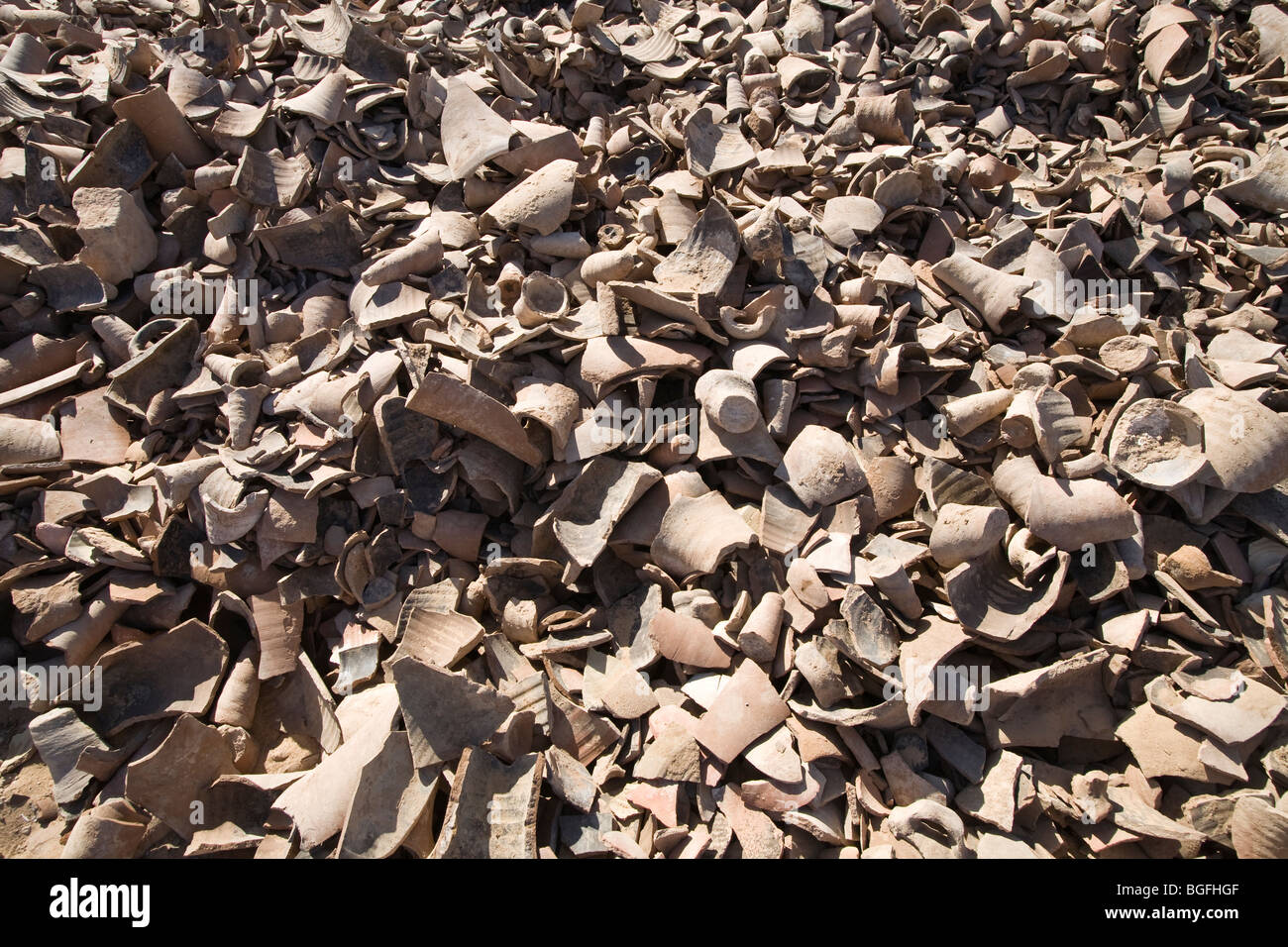 Piles of ancient pottery shards on the desert floor at Daydamus Roman ...