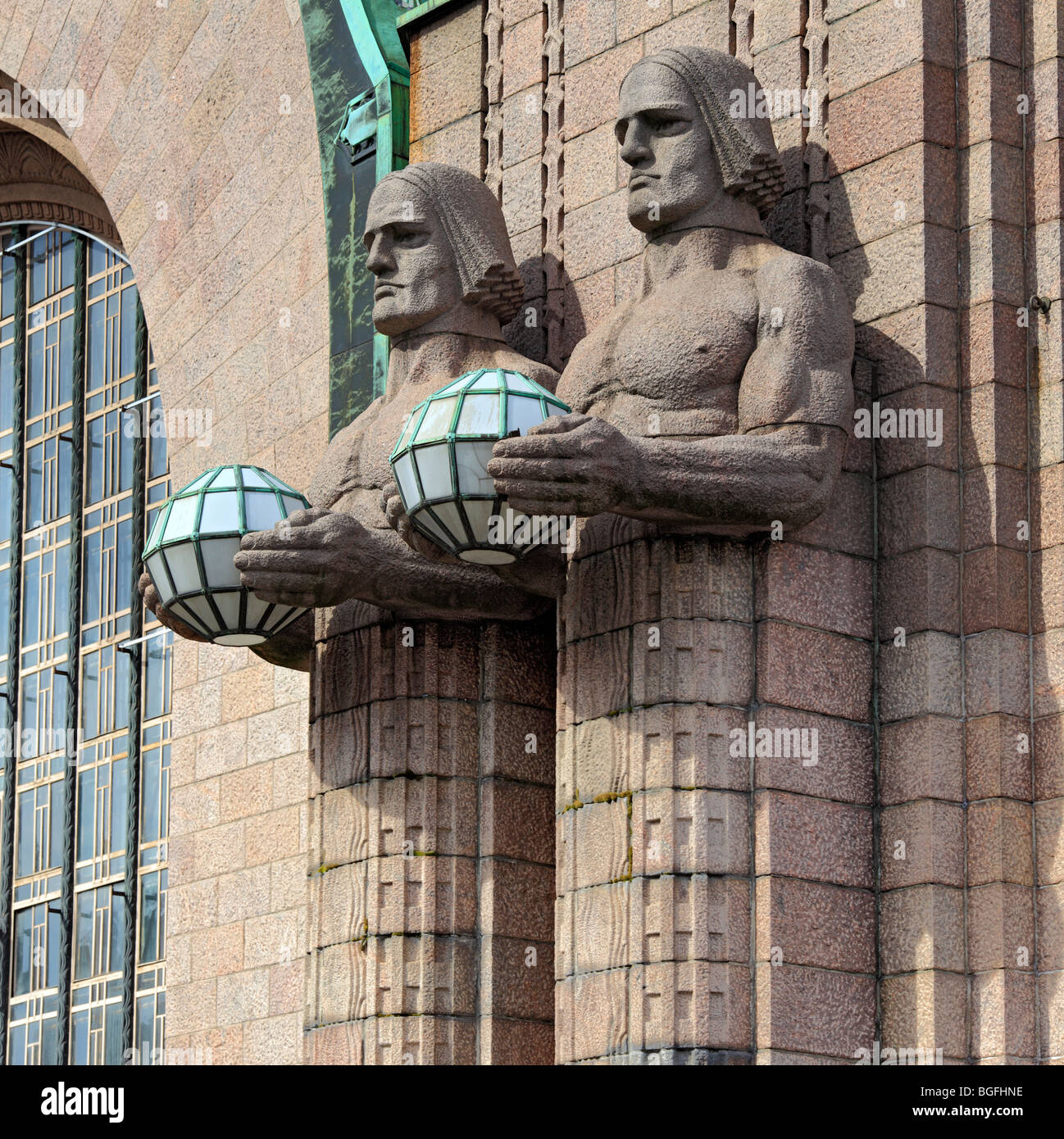 Granite statues at Helsinki Central railway station, Helsinki, Finland ...