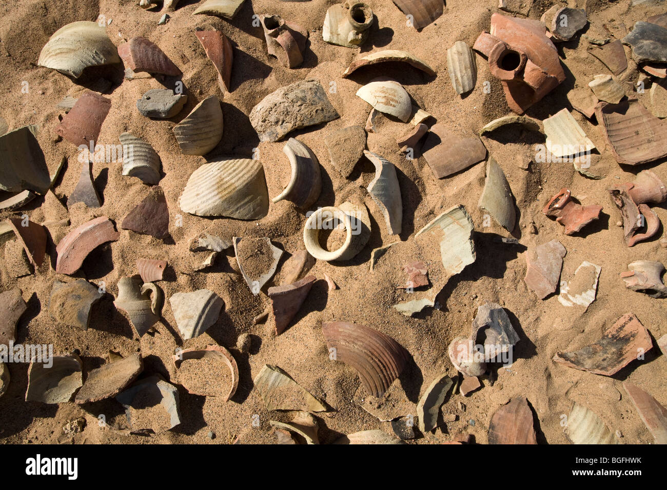 Piles of ancient pottery shards on the desert floor at Daydamus Roman ...