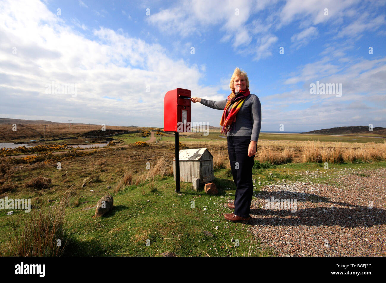 Woman posting letter in post hi-res stock photography and images - Alamy