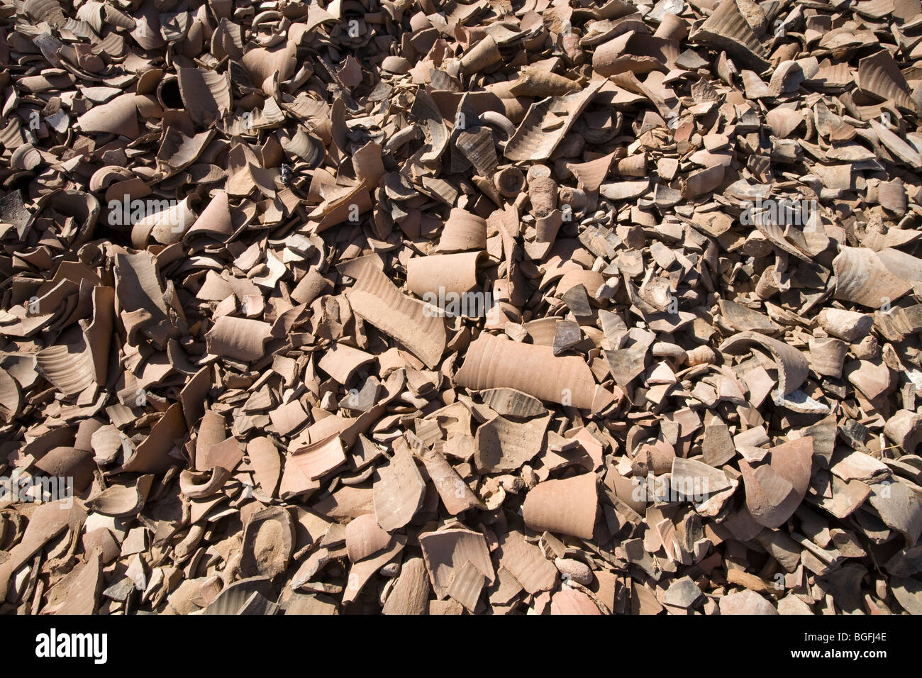 Piles of ancient pottery shards on the desert floor at Daydamus Roman ...