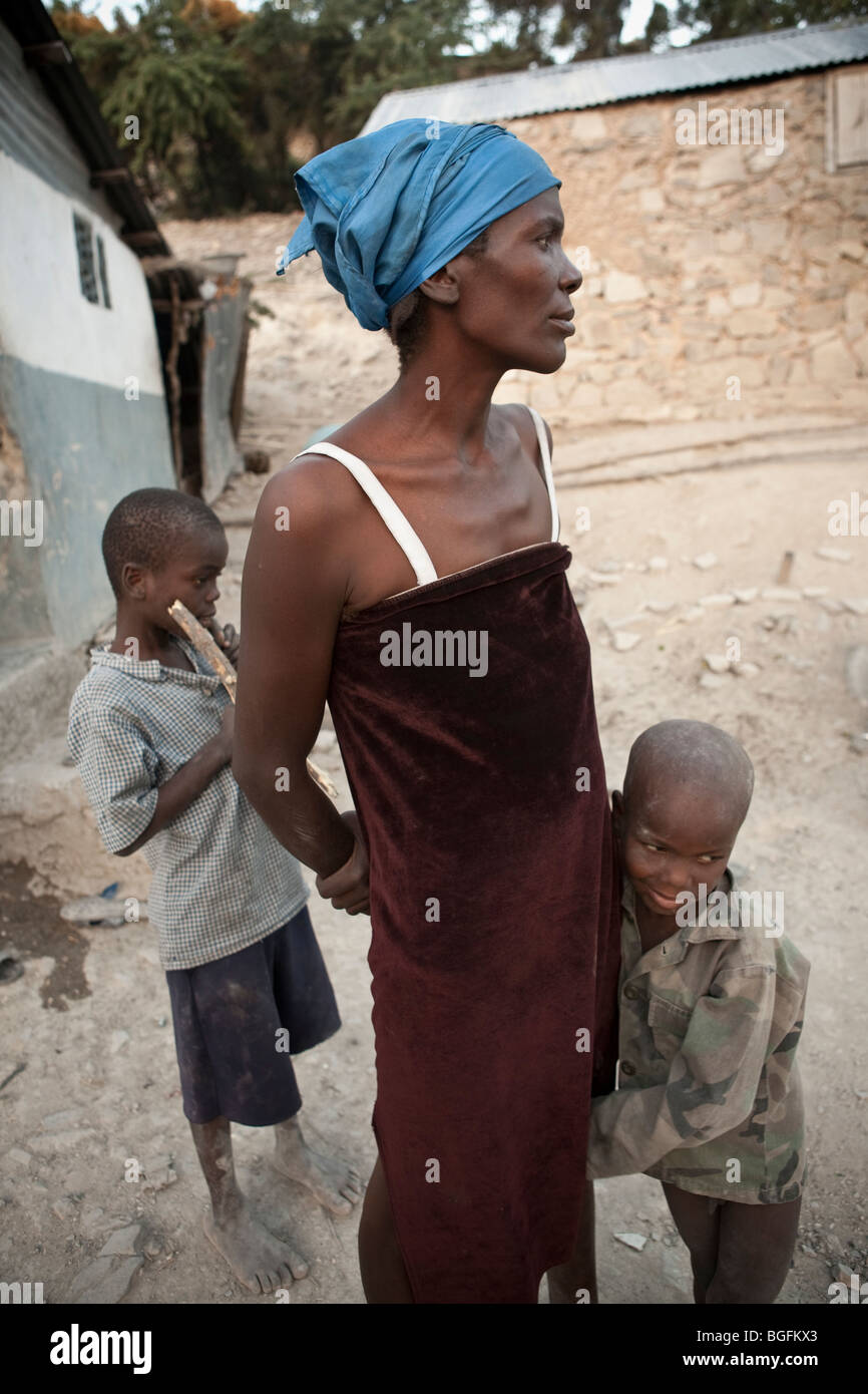 A woman suffering from TB with her children in Gonaives, Artibonite ...