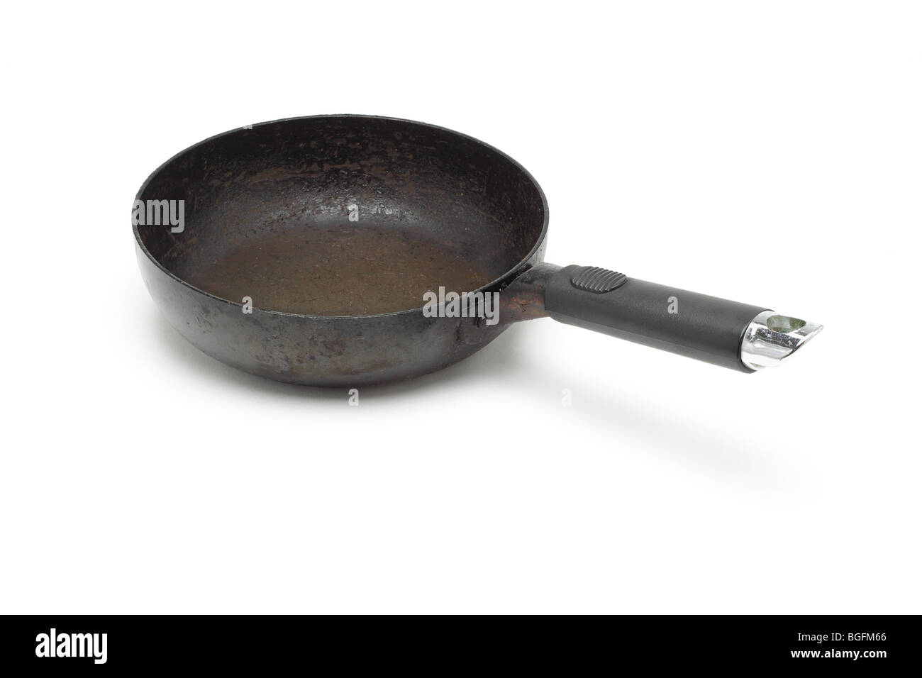 Old rusty frying pan on white background Stock Photo - Alamy