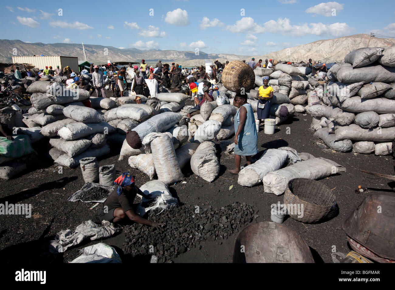 Charcoal market at the port in Gonaives, Artibonite Department, Haiti ...