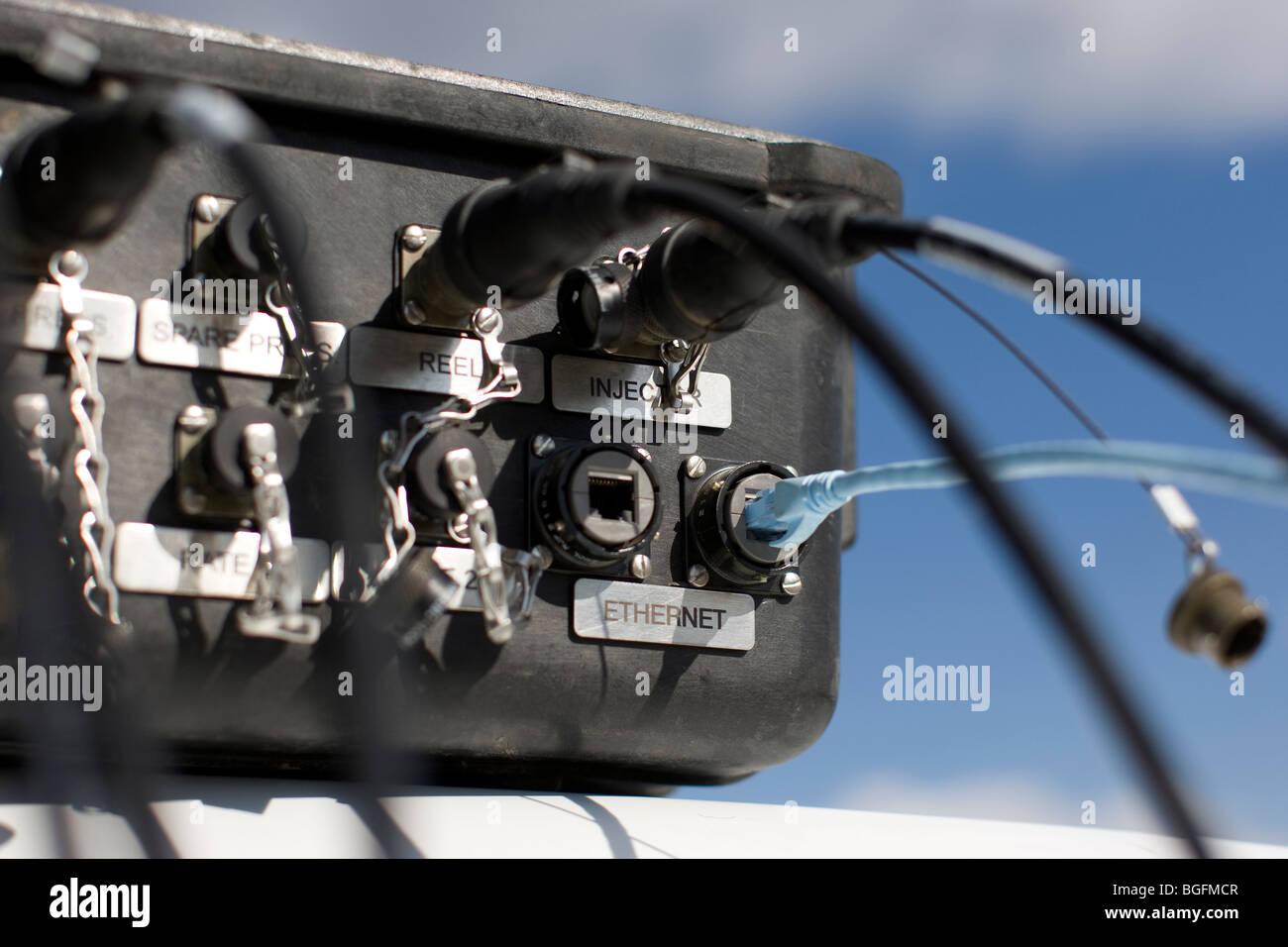 An waterproof case with computer equipment and cable connections on the ...