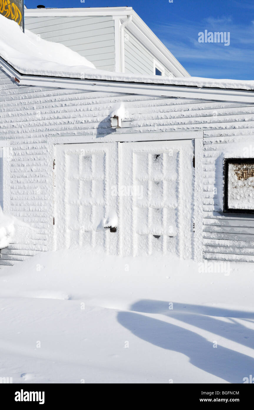 Snow covered building in winter after fresh snowstorm Stock Photo - Alamy