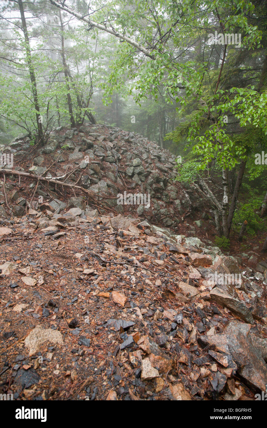 Piles of rock next to an old mine entrance on Iron Mountain in the ...